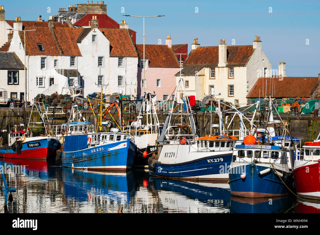 Fishing harbour with many fishing boats at Pittenweem in East Neuk of ...