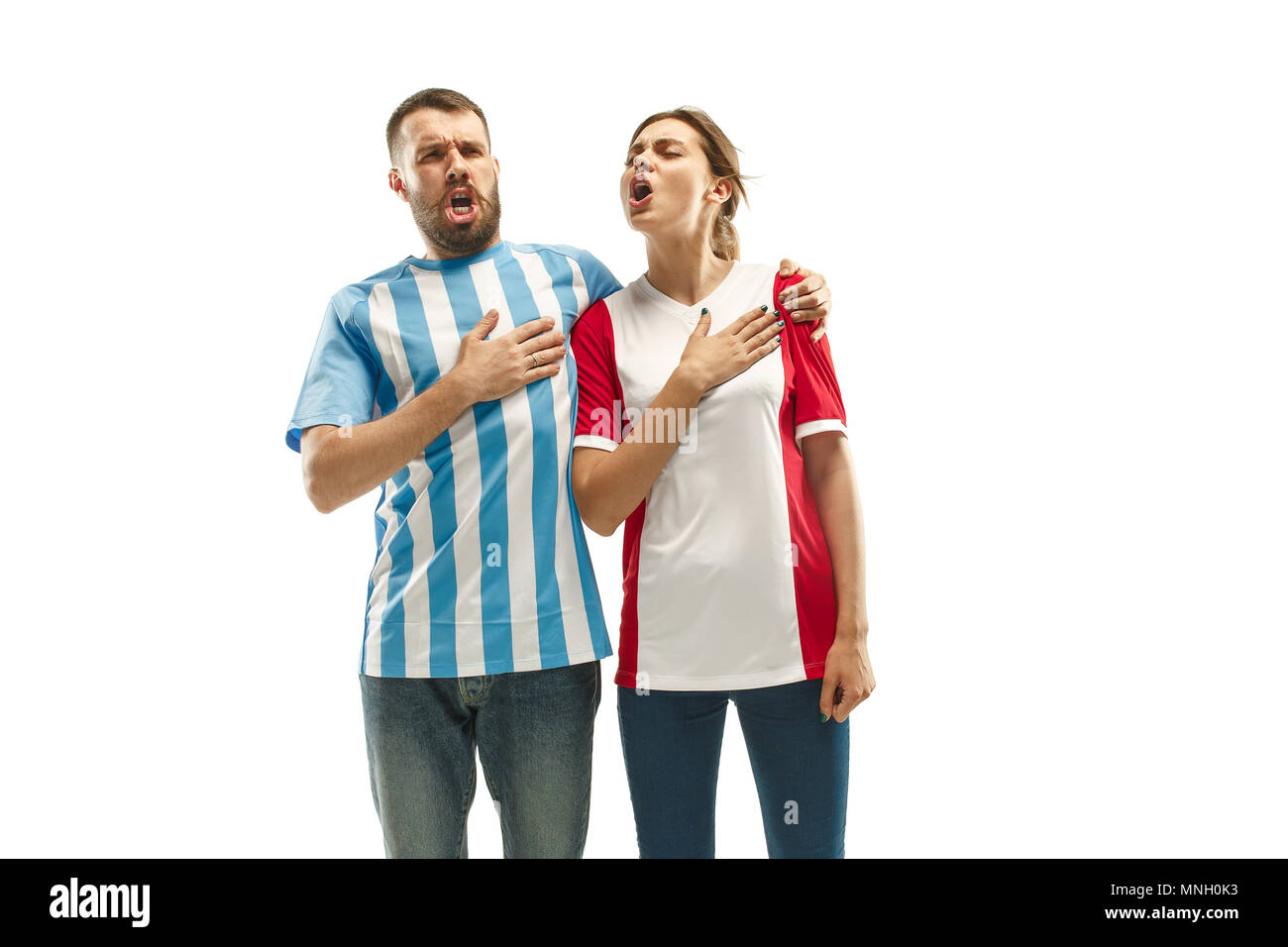 The soccer fans celebrating on white background Stock Photo - Alamy