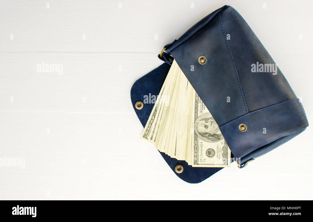money in bag on white background Stock Photo - Alamy