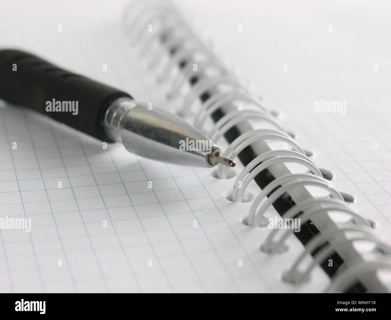 close up.ballpoint pen on open notebook background Stock Photo - Alamy