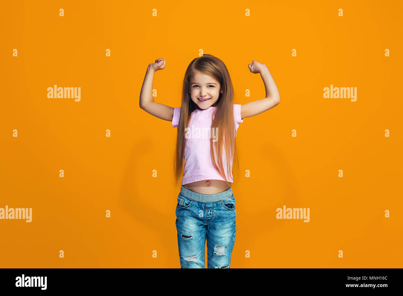 Happy success teen girl celebrating being a winner. Dynamic energetic ...