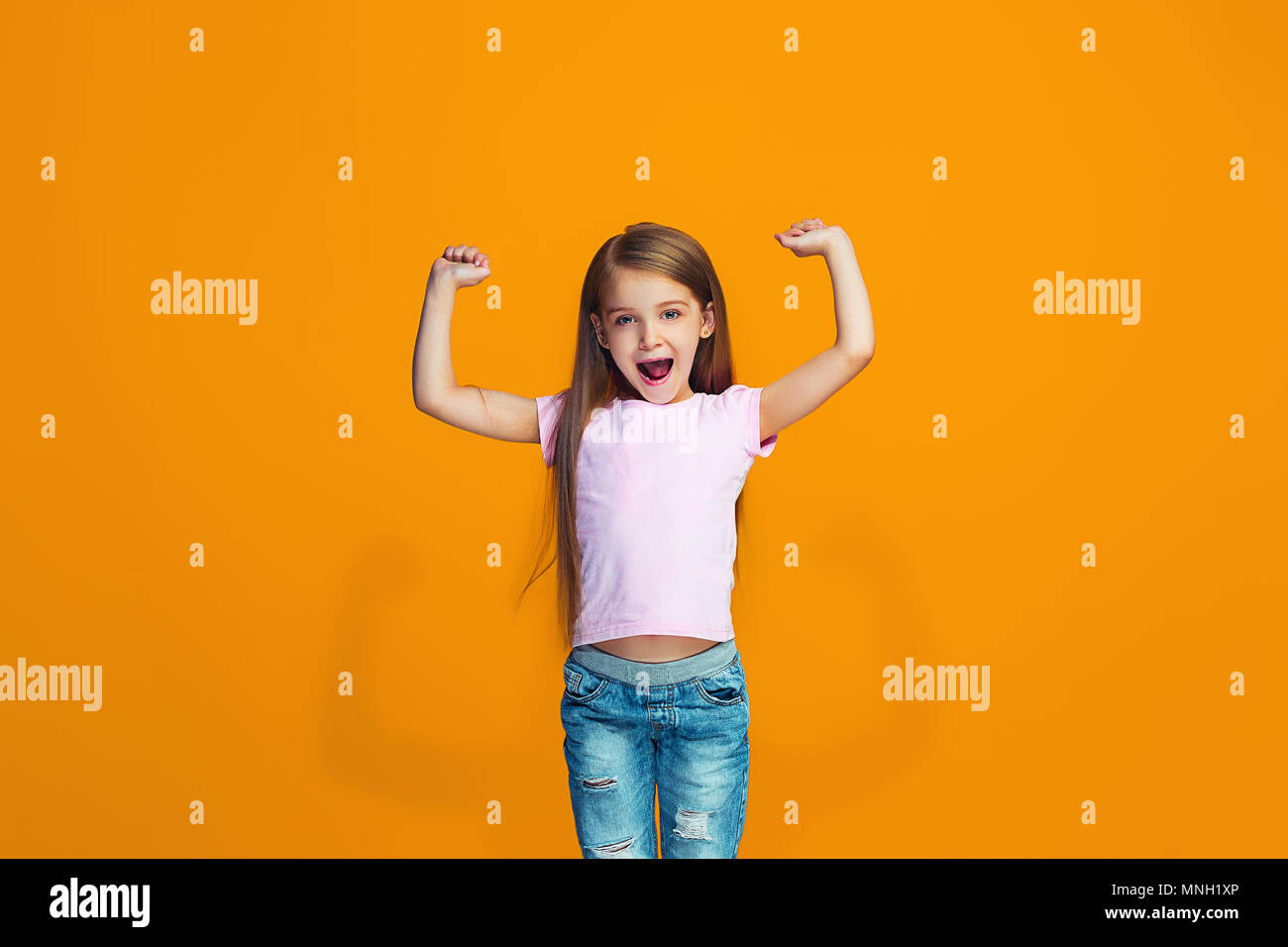 Happy success teen girl celebrating being a winner. Dynamic energetic ...