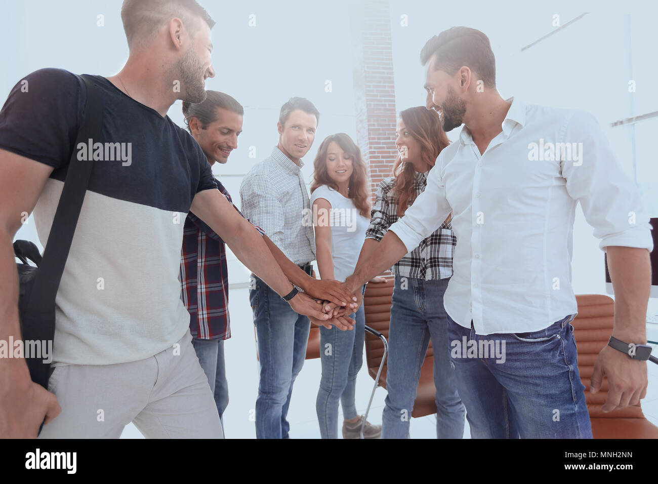 closeup .creative team folded their hands together Stock Photo - Alamy