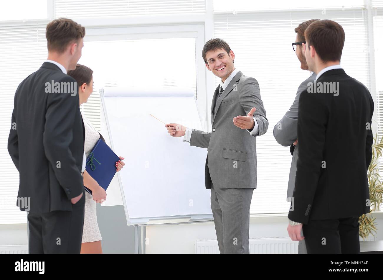 coach conducts business training for the business team Stock Photo - Alamy