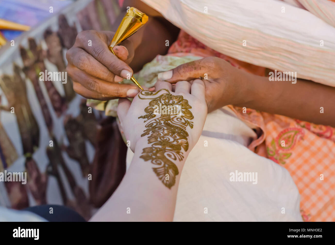 Indian woman henna tattoos on hi-res stock photography and images - Alamy