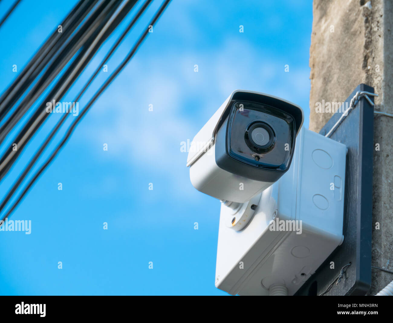 closed-circuit camera on white clouds background, closed-circuit camera ...