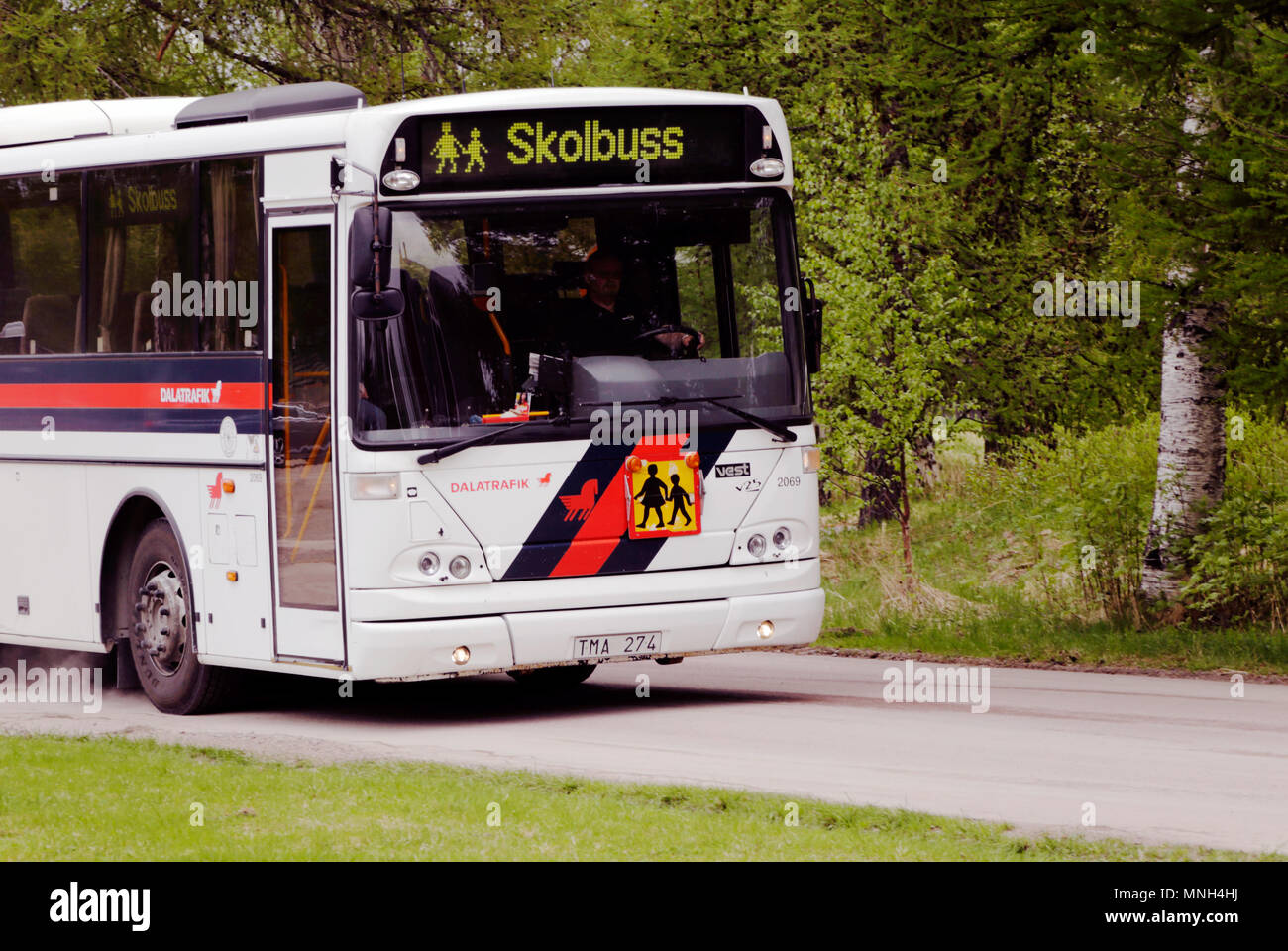 Sarna, Sweden - May 27, 2013: A school bus from Dalatrafik leaves the ...