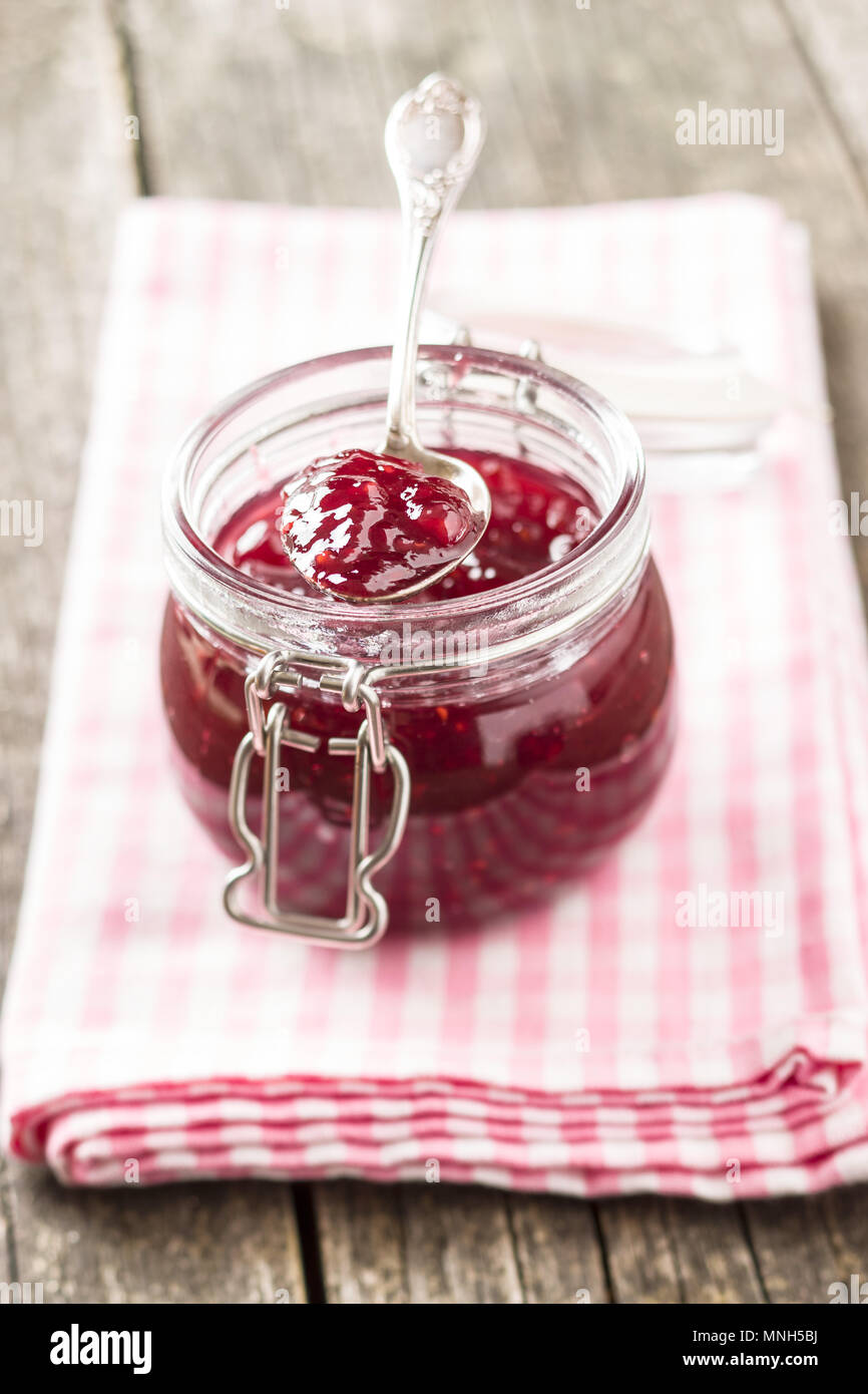 Raspberry jam jelly in jar Stock Photo - Alamy