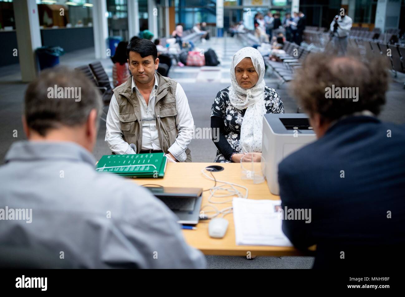 17 May 2018, Berlin, Germany: A refugee from Afghanistan is sitting in ...