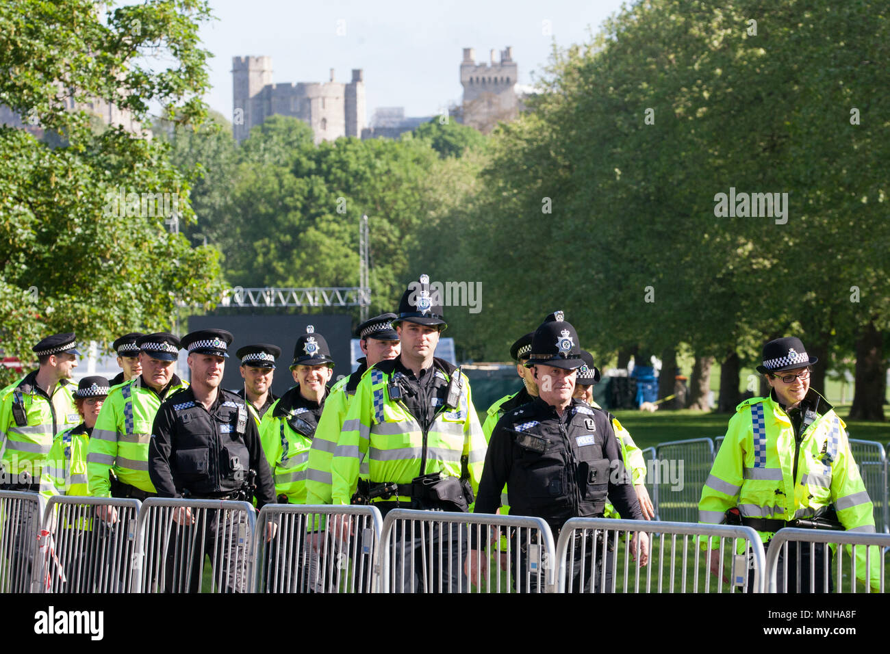 Windsor, UK. 17th May, 2018. Police officers walk along the procession ...