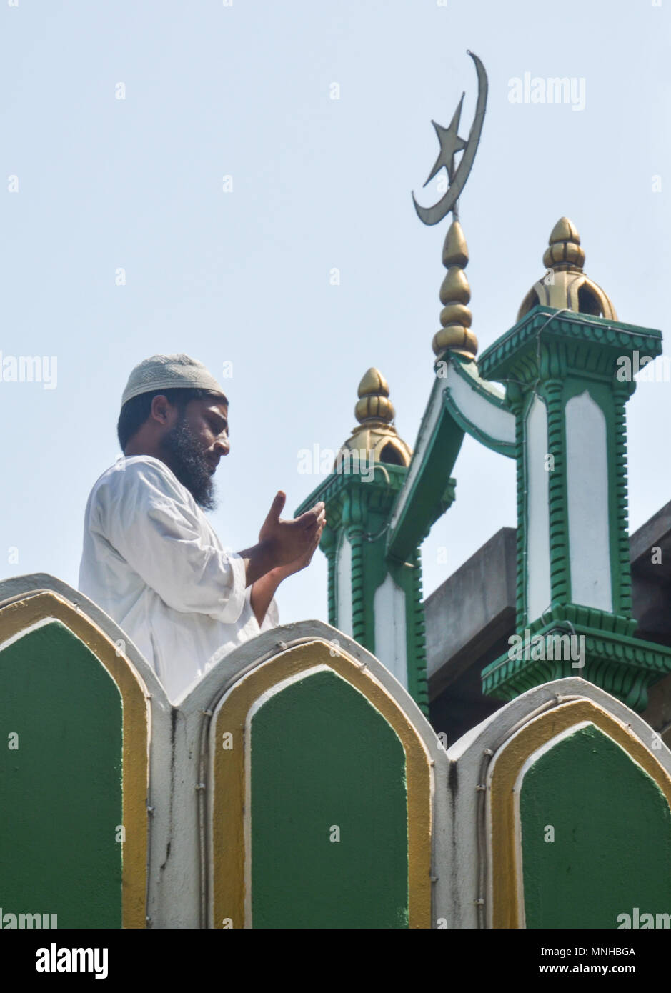 17th May 2018, Guwahati, Assam, India. A Muslim man praying on the ...