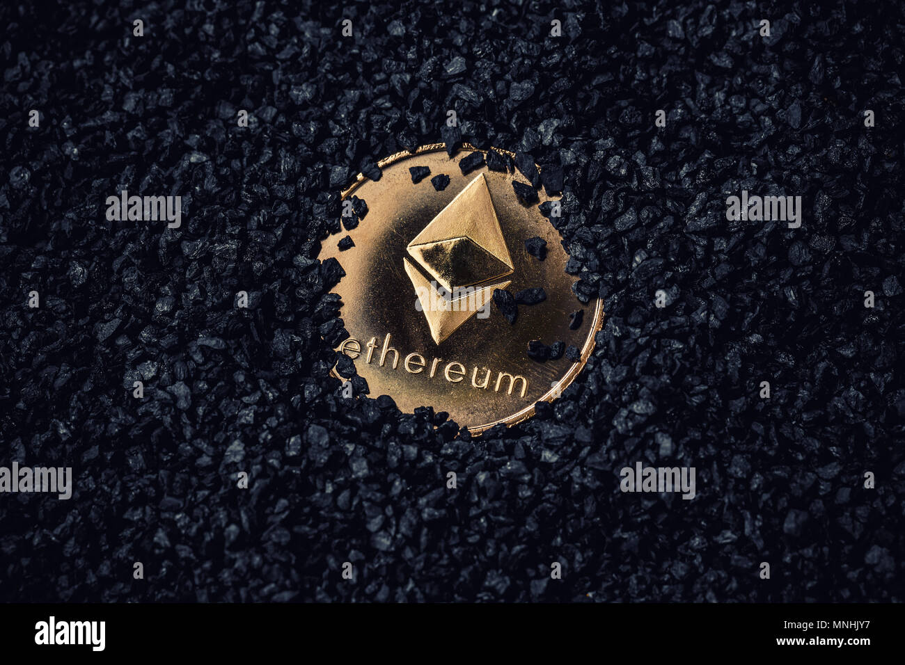 Gold coin with cryptocurrency logo. Ethereum coin on black background ...