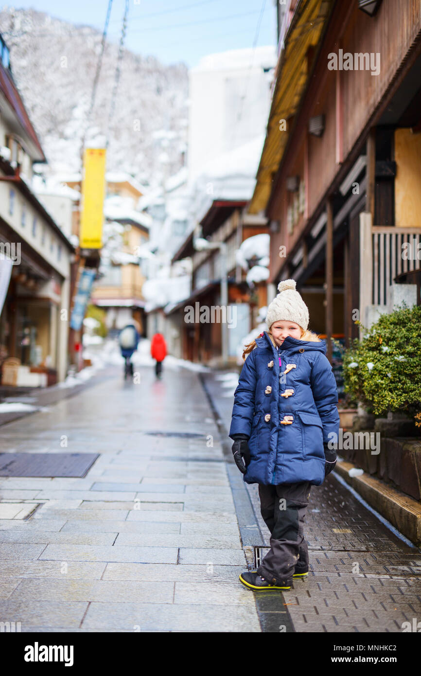 Little girl at old district of hot spring resort town Shibu onsen in ...