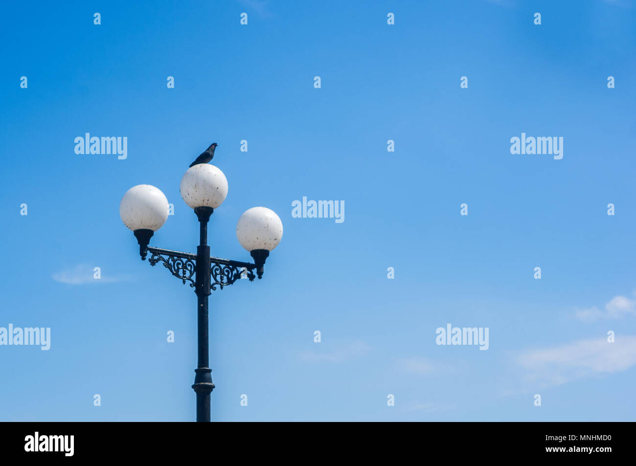 city skyline - classic lamp post with locks of lovers at sunset Stock ...