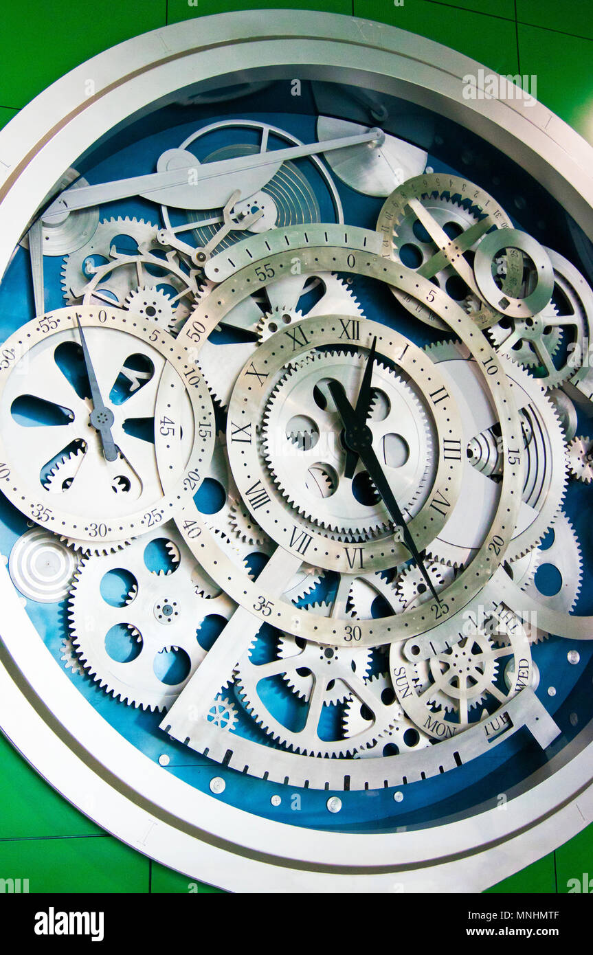 A oversized wall display of the hands, dials and internal workings of a ...