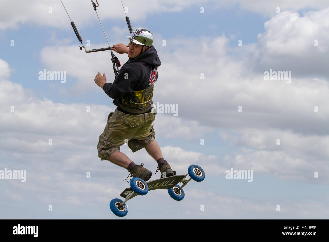 Extreme sport kite landboarding in Essex, UK. Airborne Stock Photo - Alamy