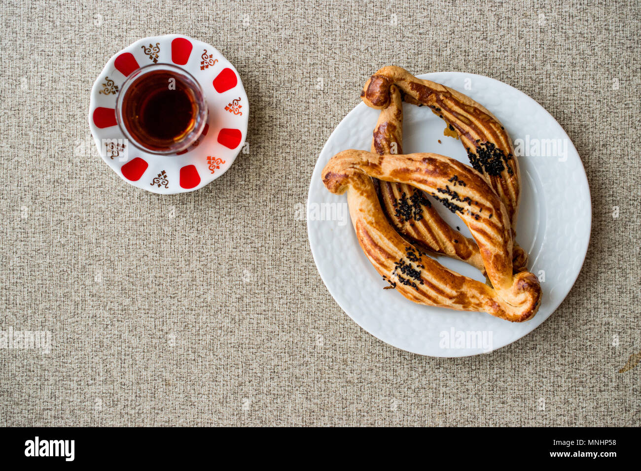 Turkish Salty Pastry Catal with tea. Turkish Cookie Stock Photo - Alamy