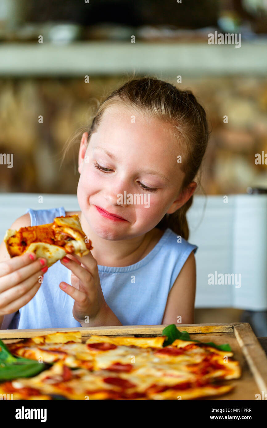 Little girl eating lunch smiling hi-res stock photography and images ...