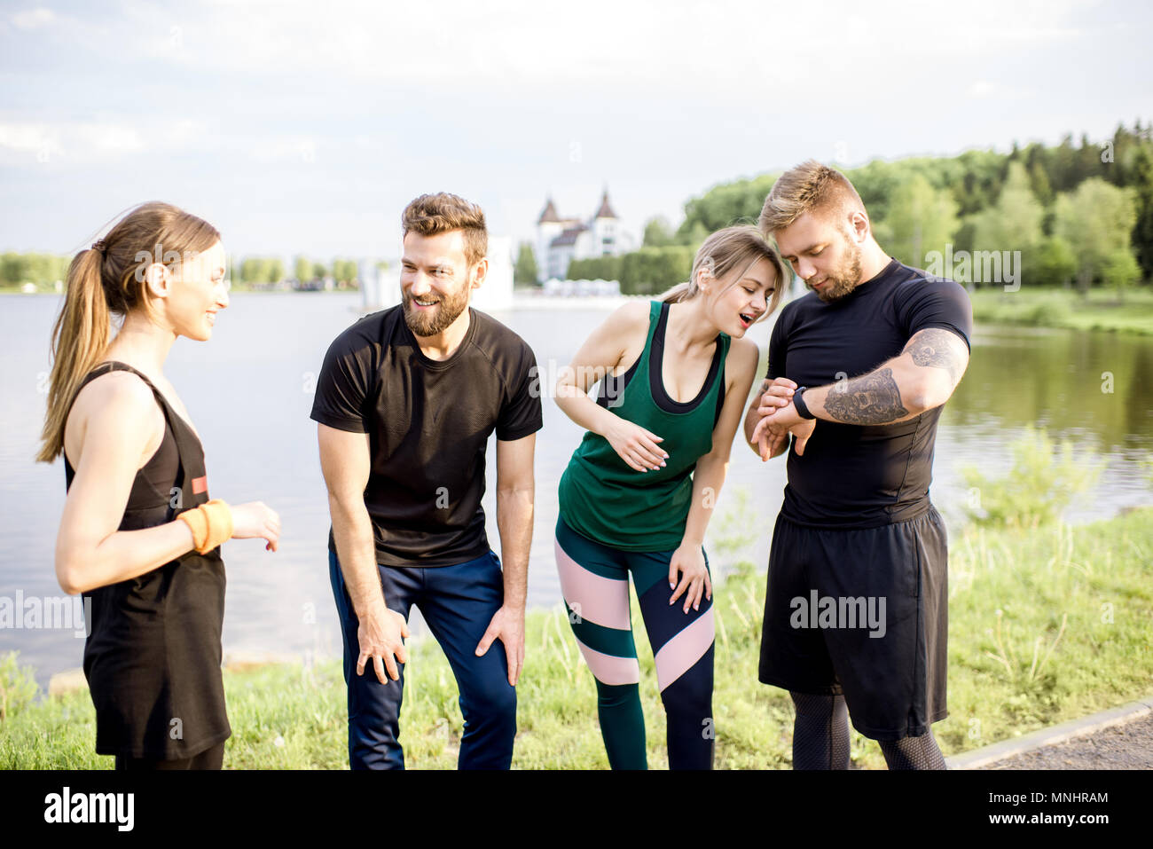 Sports team having fun standing together after the training outdors in ...