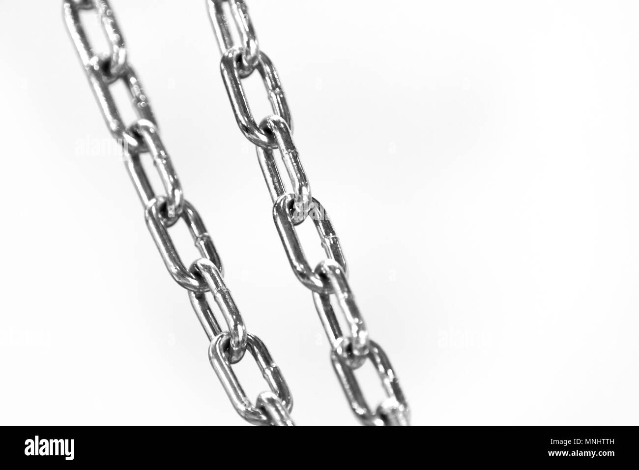 Abstract close up photo of metal chains isolated on white background ...