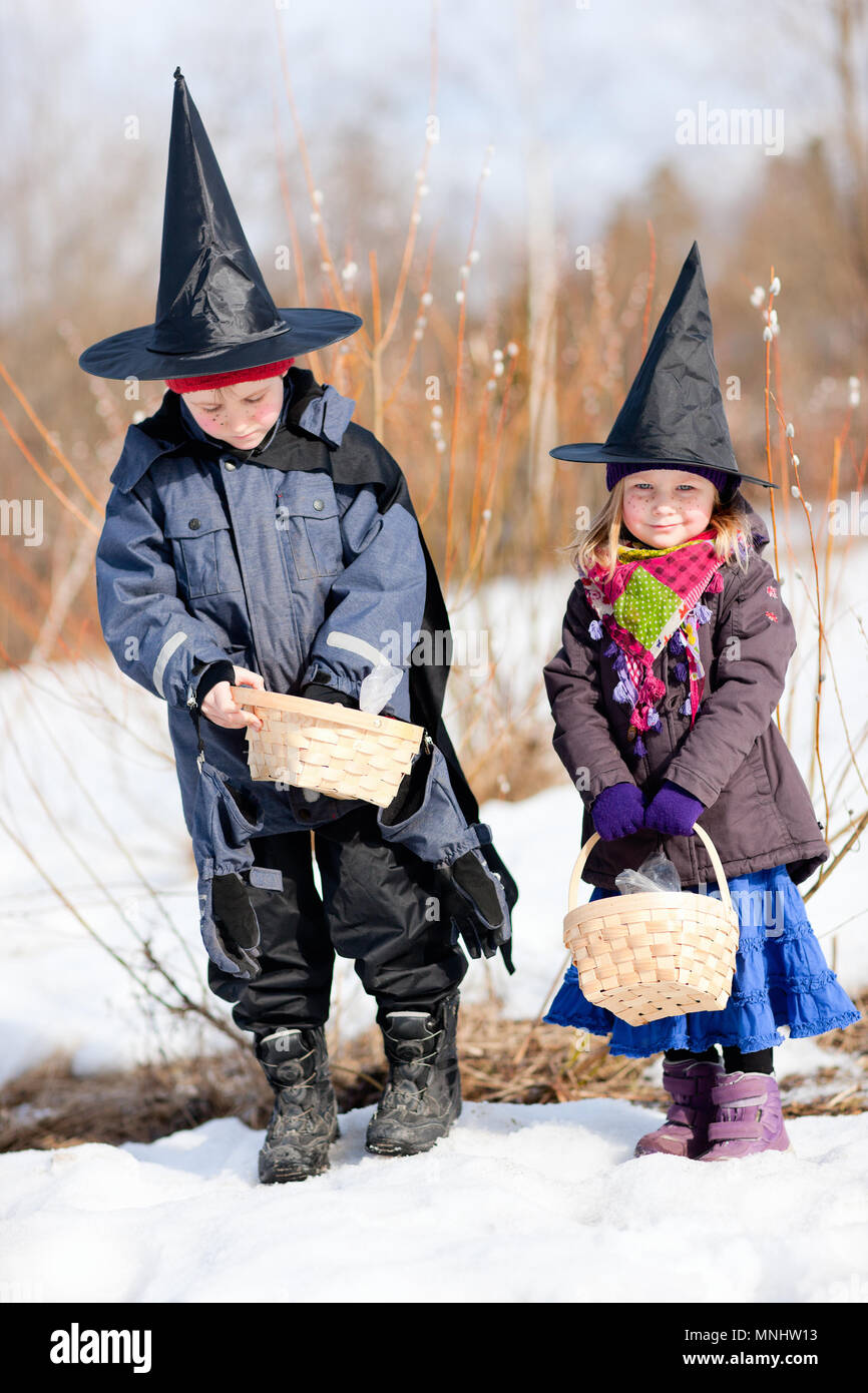 Kids outdoors dressed for Easter traditional celebration in Finland ...