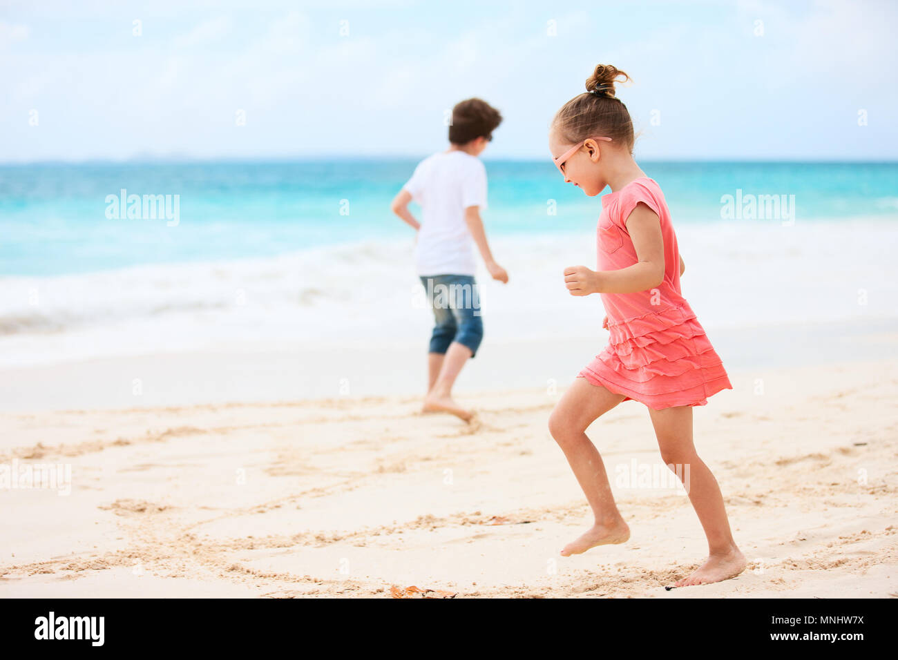 Kids having fun at the beach hi-res stock photography and images - Alamy
