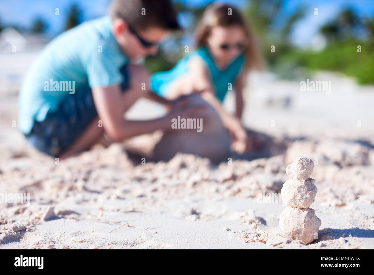 Boy building sandcastle on beach hi-res stock photography and images ...