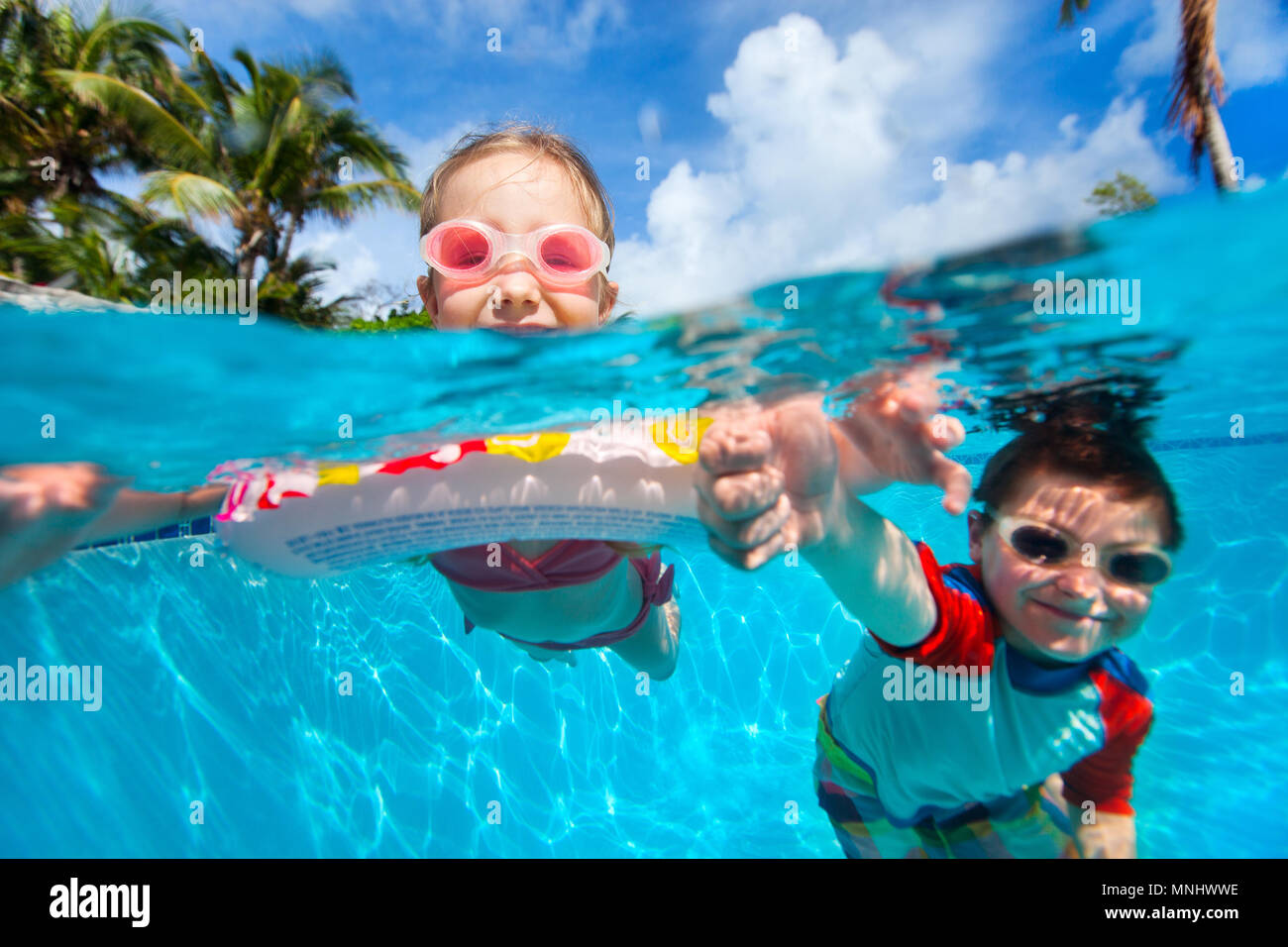 Half underwater pool hi-res stock photography and images - Alamy