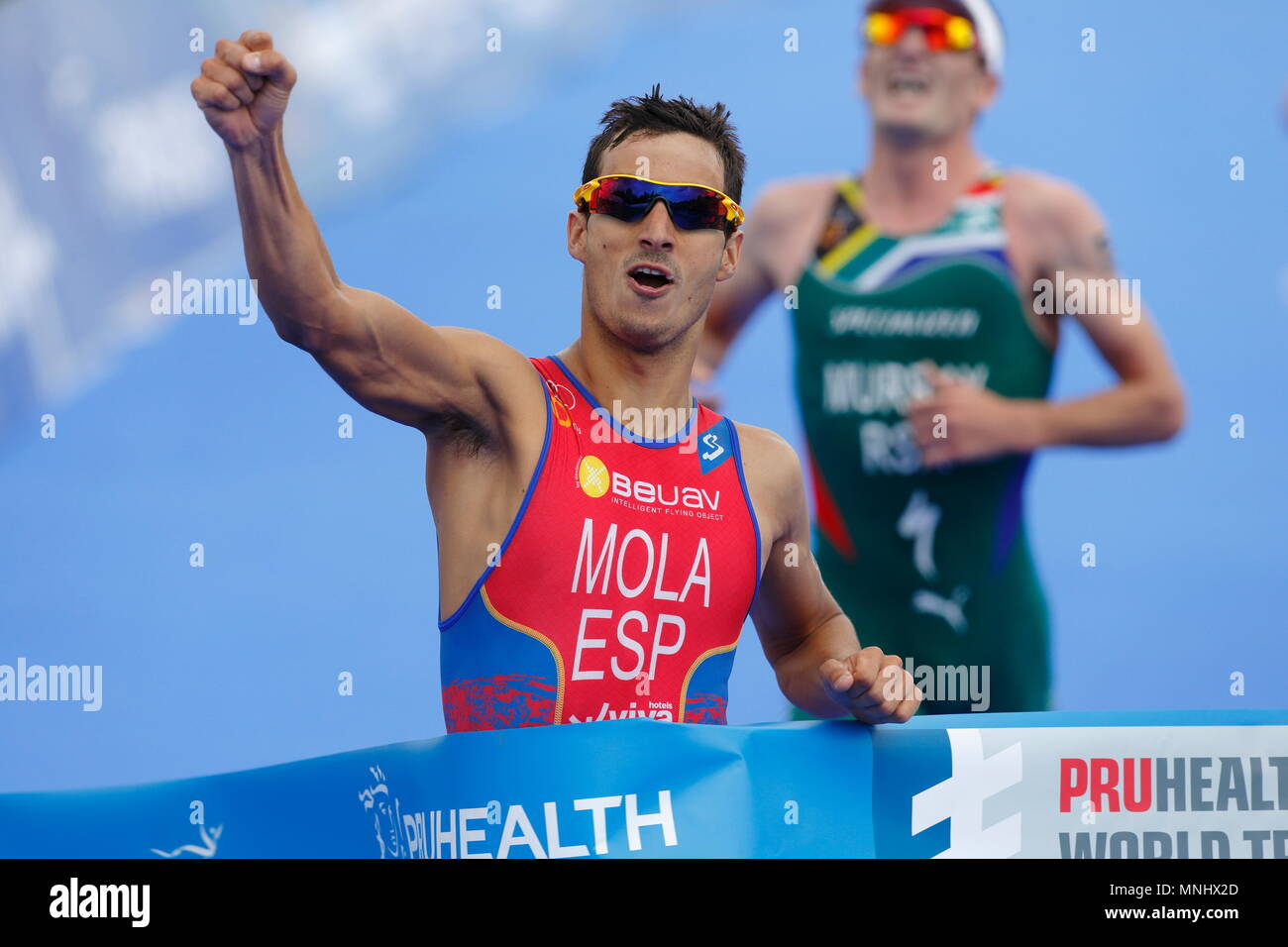 Mario Mola celebrates the win to the finish line during the Elite Men's ...