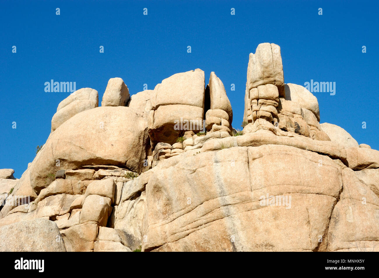 Monzogranite rock pile, Barker Dam nature trail. Big Horn Dam, Joshua ...