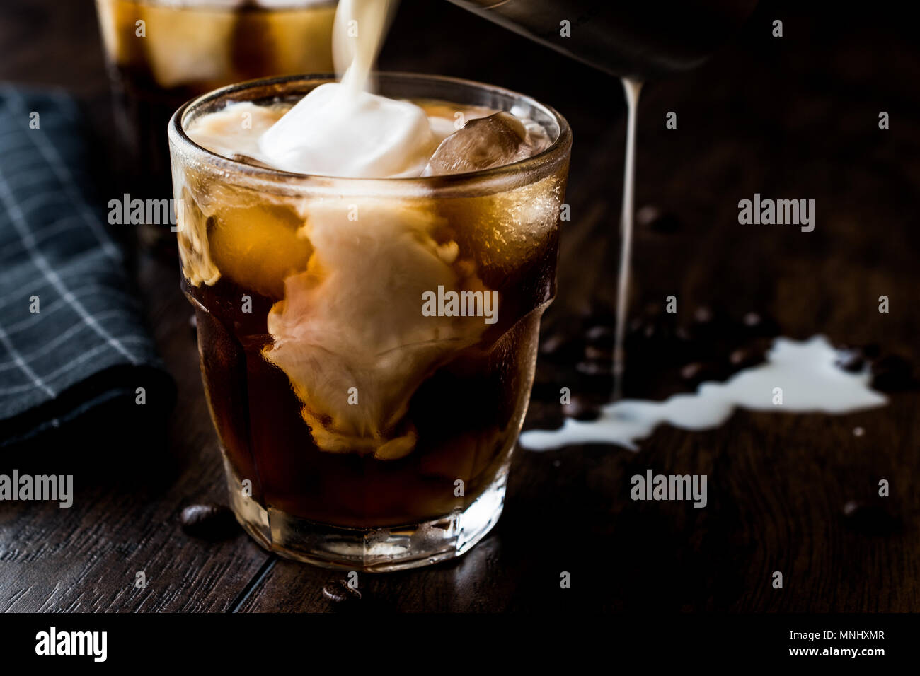 Pouring milk cold coffee hi-res stock photography and images - Alamy