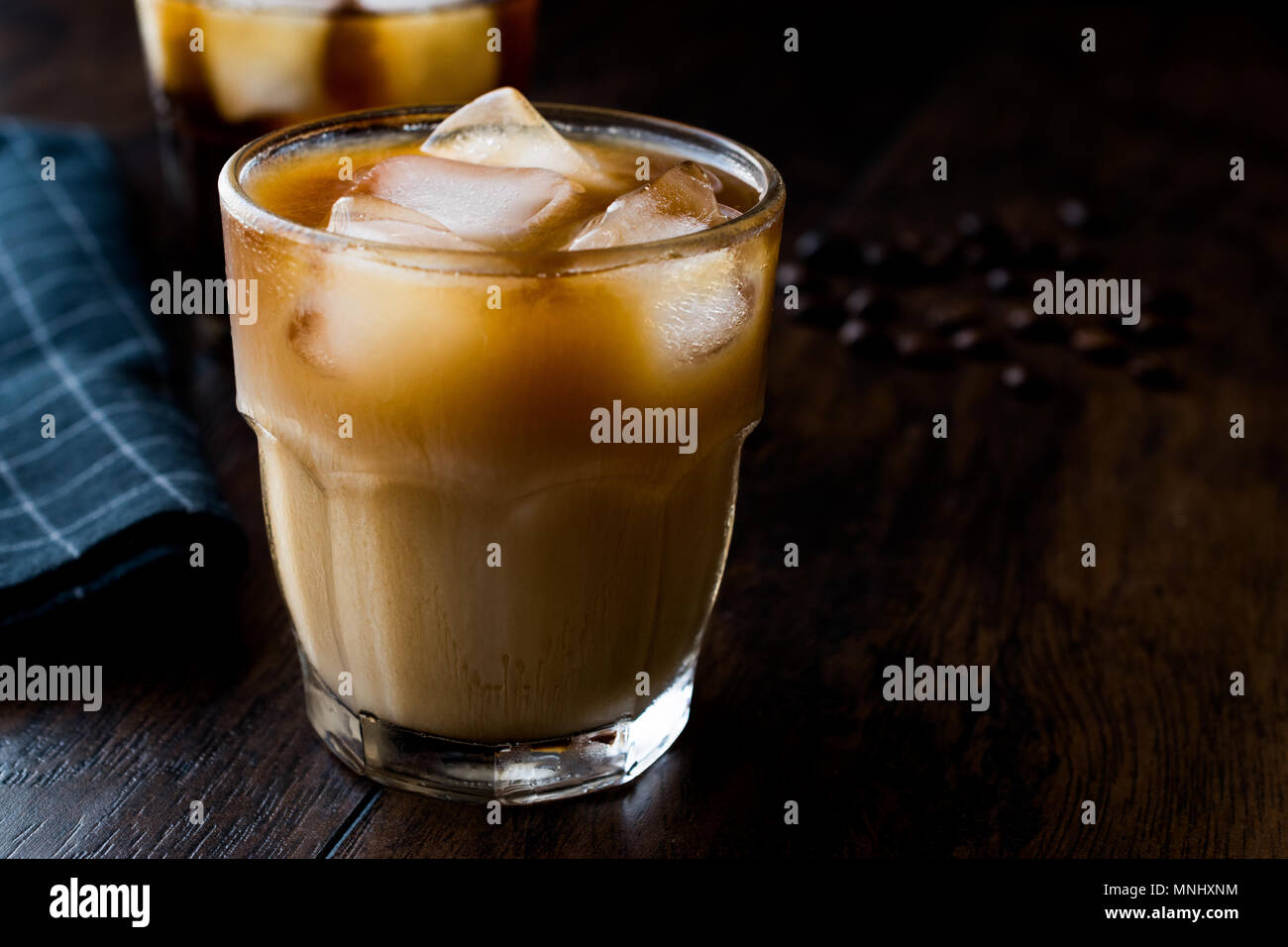 Cold brew coffee with milk and ice. (iced coffee). Organic Beverage ...