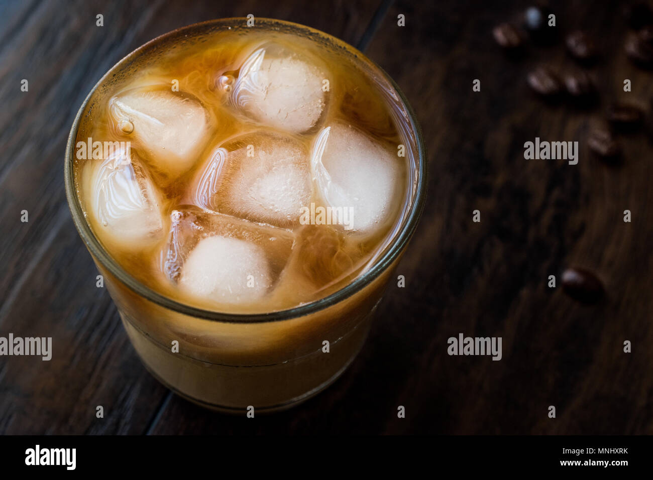 Cold brew coffee with milk and ice. (iced coffee). Organic Beverage ...