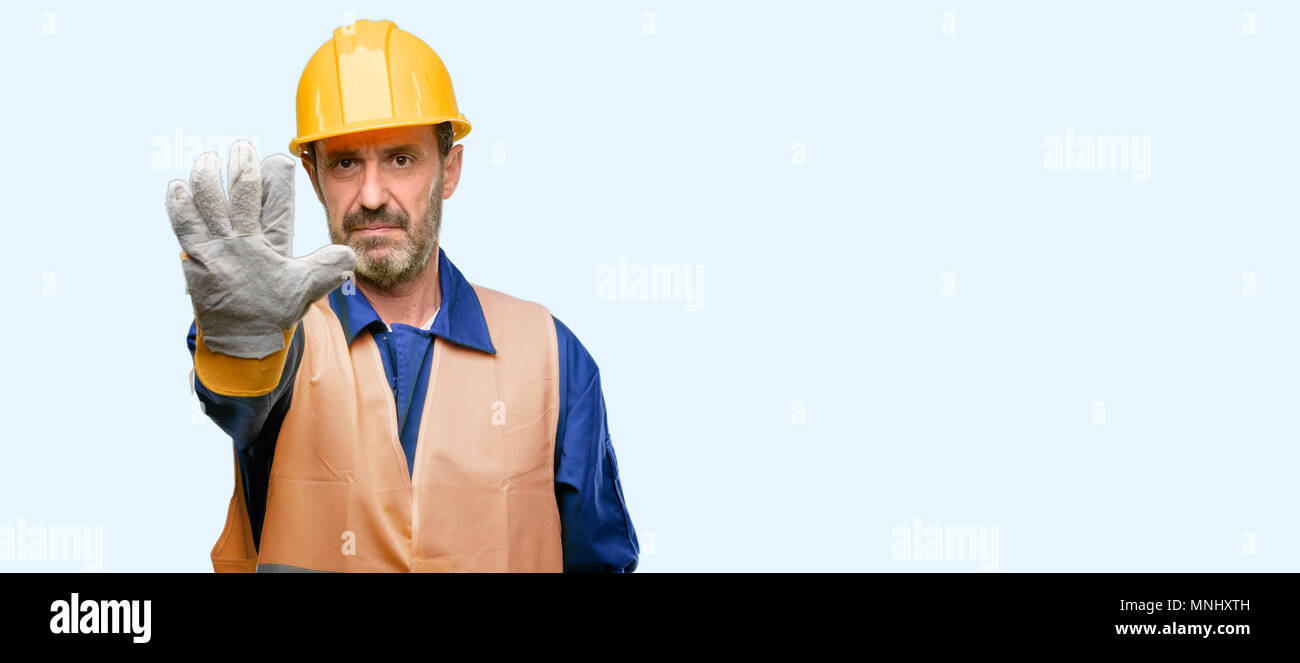 Senior engineer man, construction worker annoyed with bad attitude ...