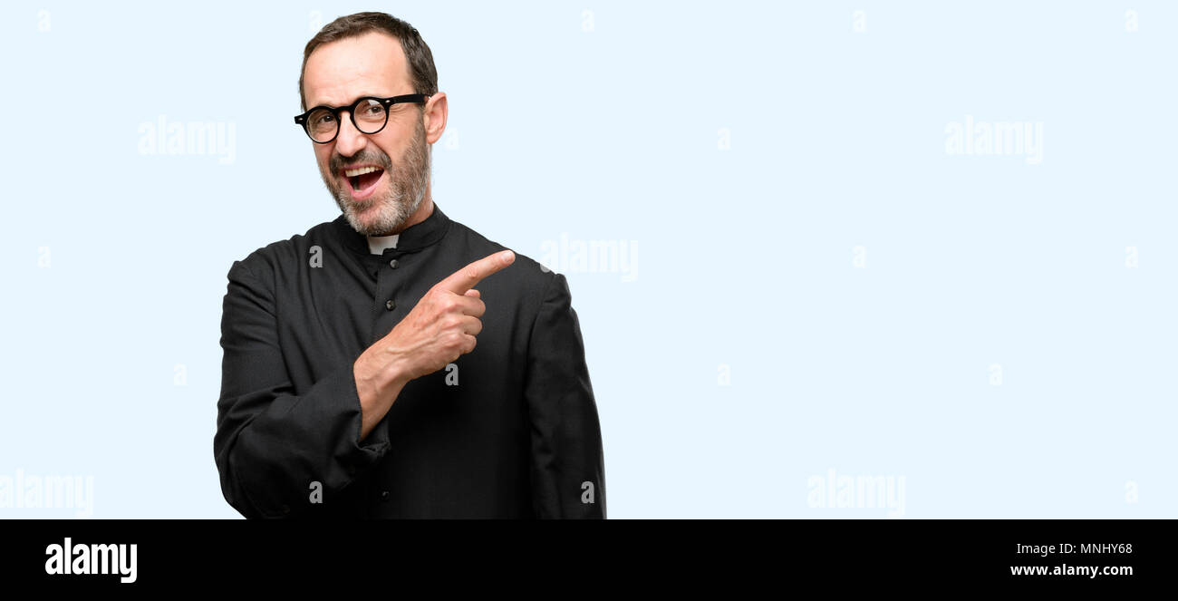 Priest looking away religion standing hi-res stock photography and ...
