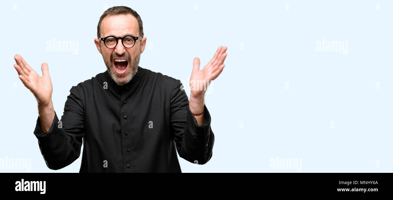 Priest religion man happy and surprised cheering expressing wow gesture ...