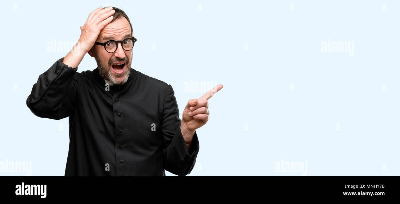 Priest looking away religion standing hi-res stock photography and ...