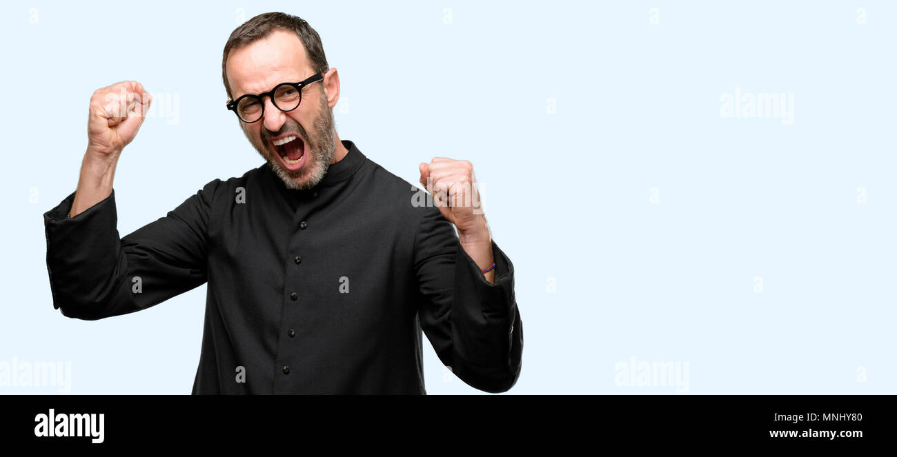 Priest religion man happy and excited celebrating victory expressing ...