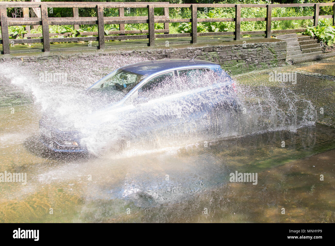 Car splash through river ford hi-res stock photography and images - Alamy
