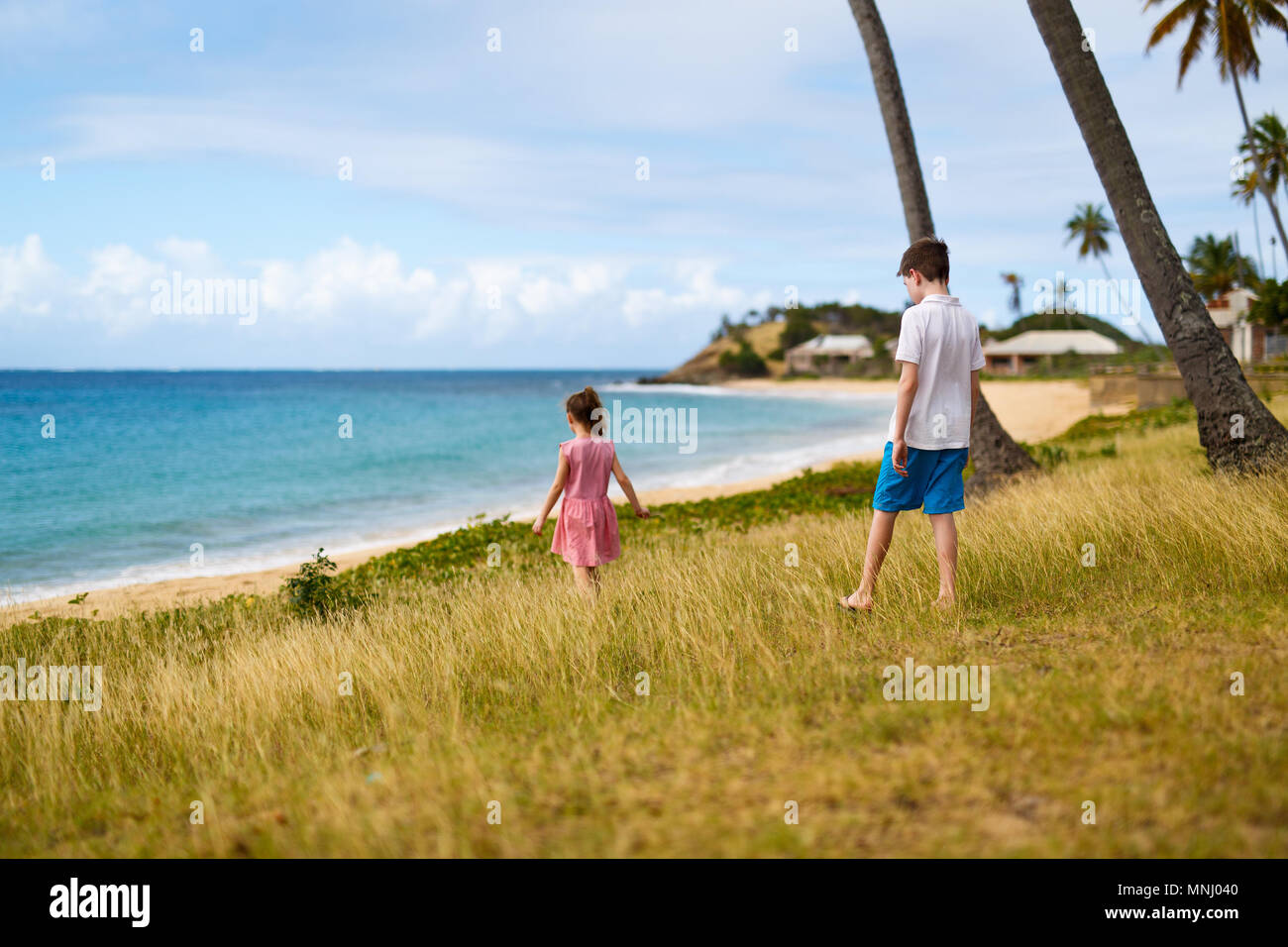 Child exploring the seashore hi-res stock photography and images - Alamy