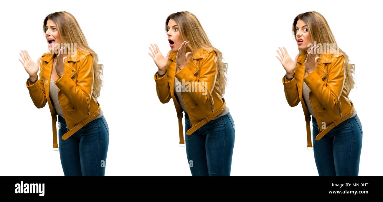 Beautiful young woman stressful keeping hands on head, terrified in ...