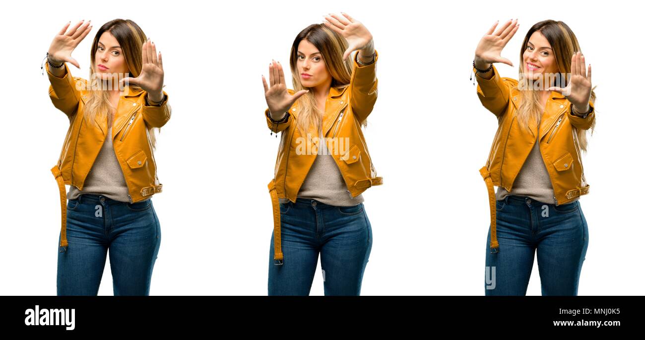 Beautiful young woman confident and happy showing hands to camera ...