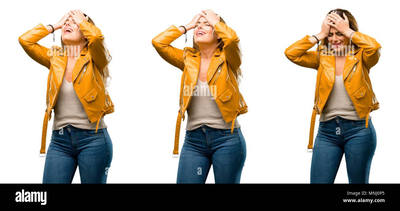 Beautiful young woman stressful keeping hands on head, tired and ...