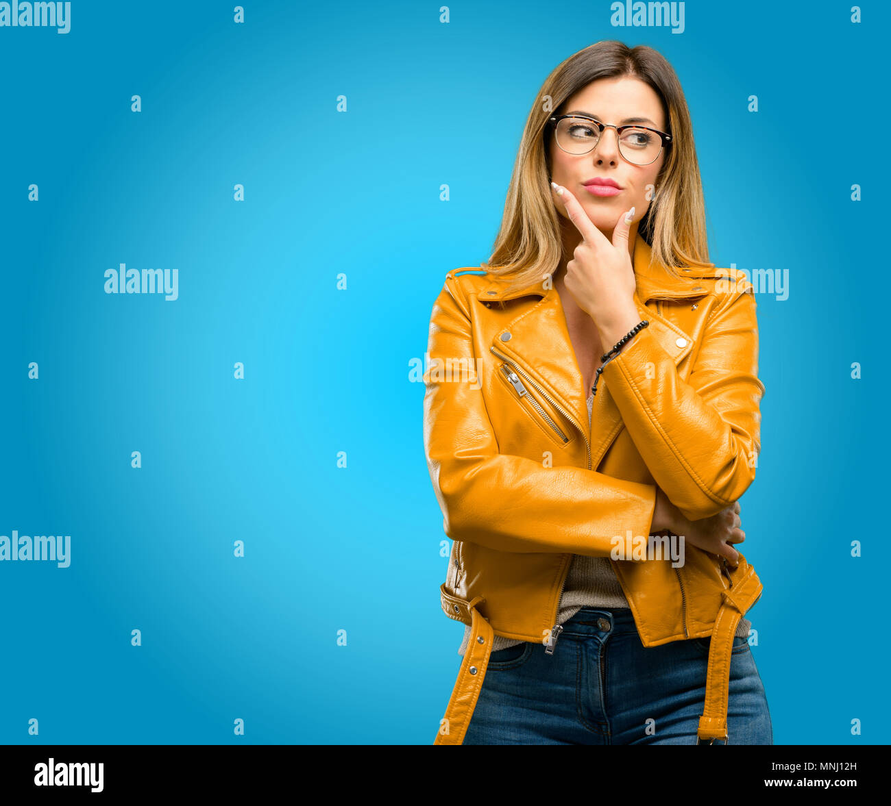 Beautiful young woman doubt expression, confuse and wonder concept ...