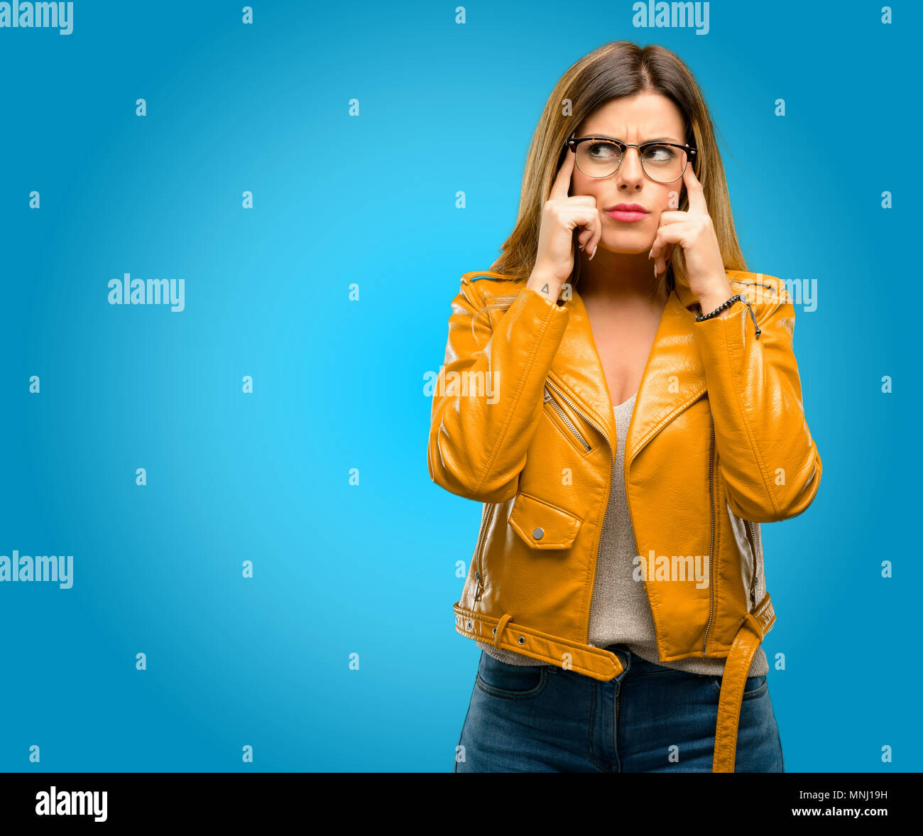 Beautiful young woman doubt expression, confuse and wonder concept ...