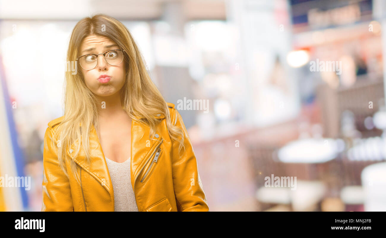 Puffing out cheeks hi-res stock photography and images - Alamy