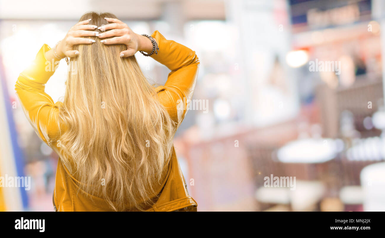 Beautiful young woman backside, rear view at restaurant Stock Photo - Alamy