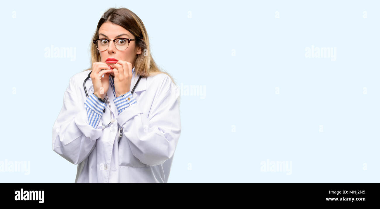 Young doctor woman, medical professional terrified and nervous ...