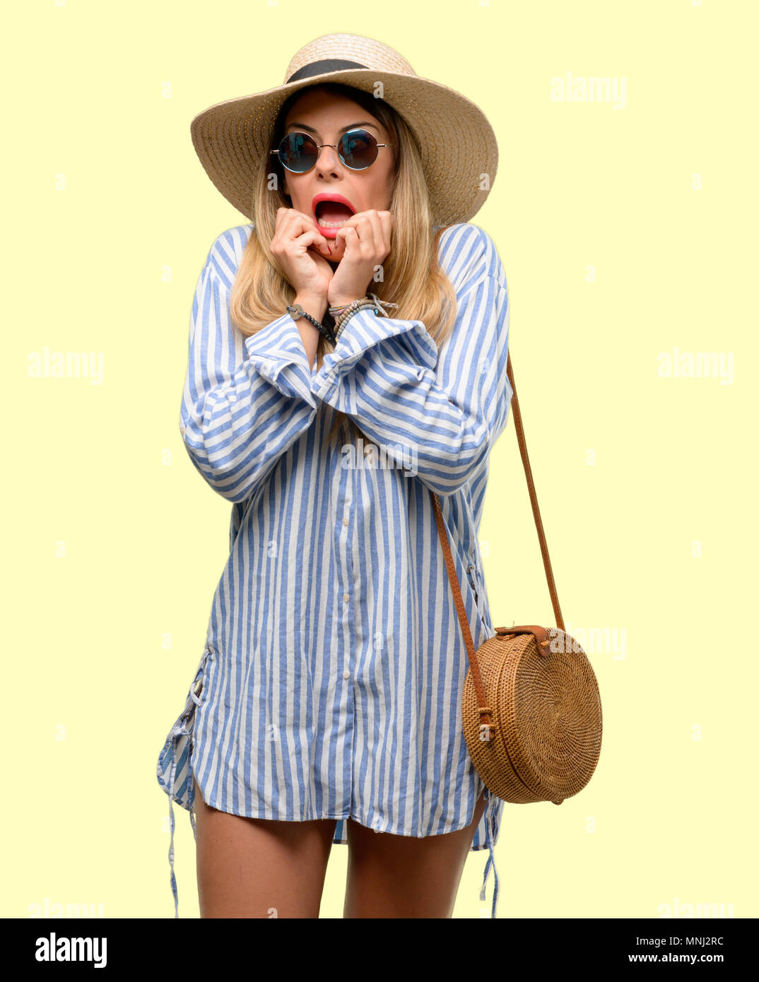 Woman embarrassed beach hi-res stock photography and images - Alamy