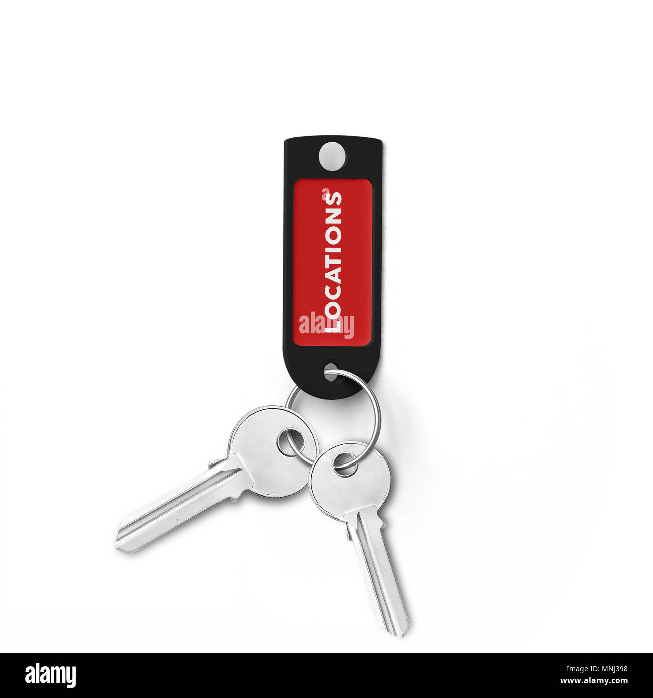 Plastic key ring with "locations" tag attached on two metal keys on ...
